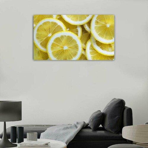 Картина на холсте 60x110 LinxOne "Круглые желтые куски лимона" интерьерная для дома / на стену / на кухню / с подрамником