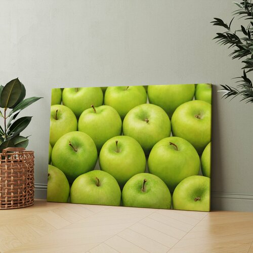 Картина на холсте "Куча зеленых яблок, сидящих рядом друг с другом" 40x60 см. Интерьерная, на стену.