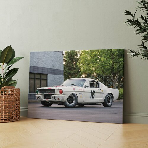 Картина на холсте "Белая гоночная машина припаркована перед зданием" 30x40 см. Интерьерная, на стену.