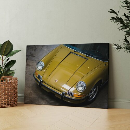 Картина на холсте "Желтый спортивный автомобиль, припаркованный в гараже" 50x70 см. Интерьерная, на стену.